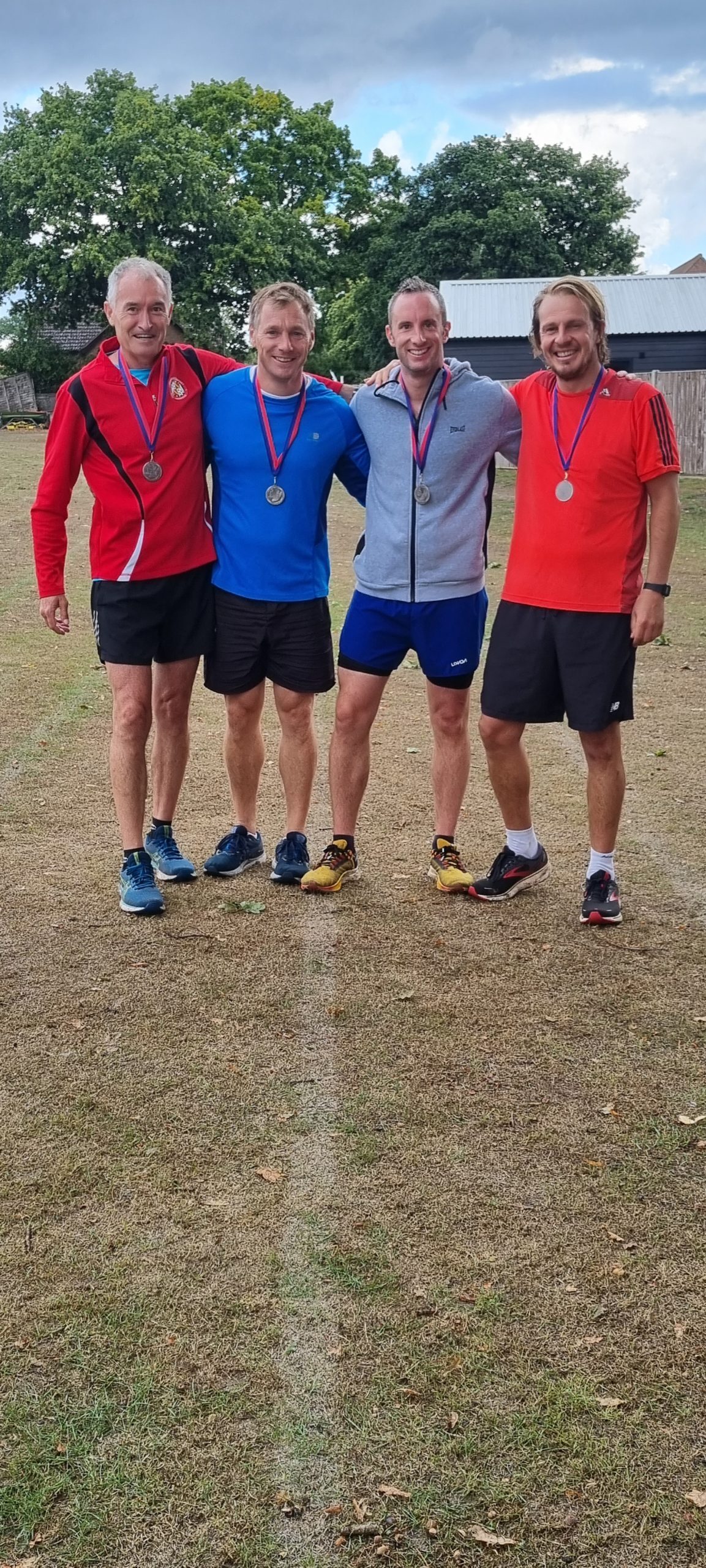 Students v staff and parent cross country relay - Woodbridge School